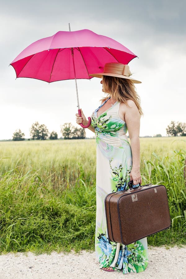 Beautiful Lady Walking on a Path in the Rain Stock Photo - Image of ...