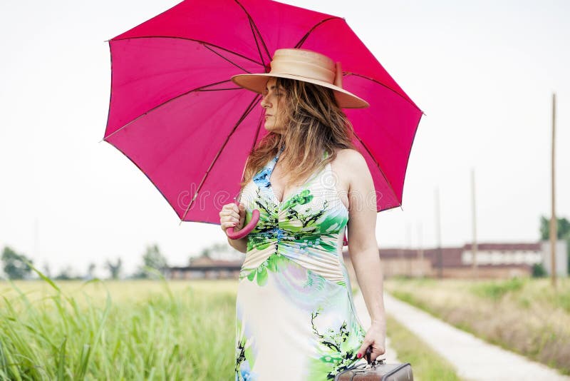 Beautiful Lady Walking on a Path in the Rain Stock Image - Image of ...