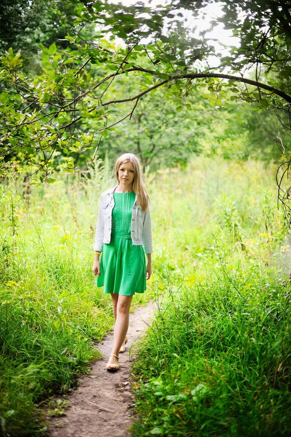 Beautiful Lady in a Wild Forest Stock Photo - Image of person, green ...