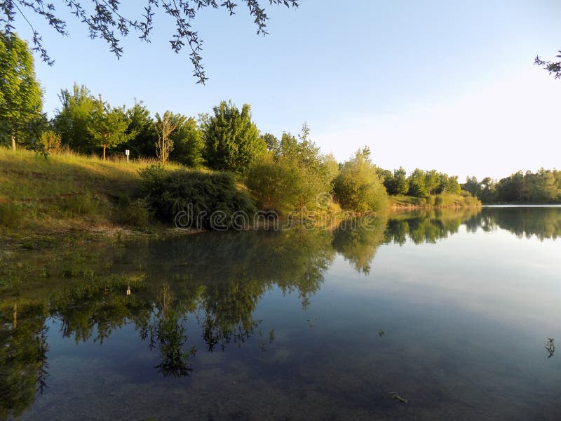 A beautiful lake stock photo. Image of trees, sunset - 147652658