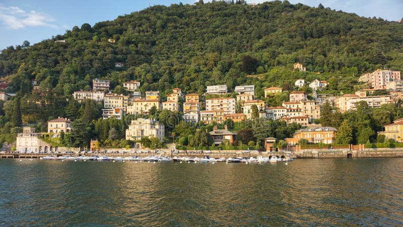 View from the Water of Lake Como in the Rays of the Setting Sun. Stock ...
