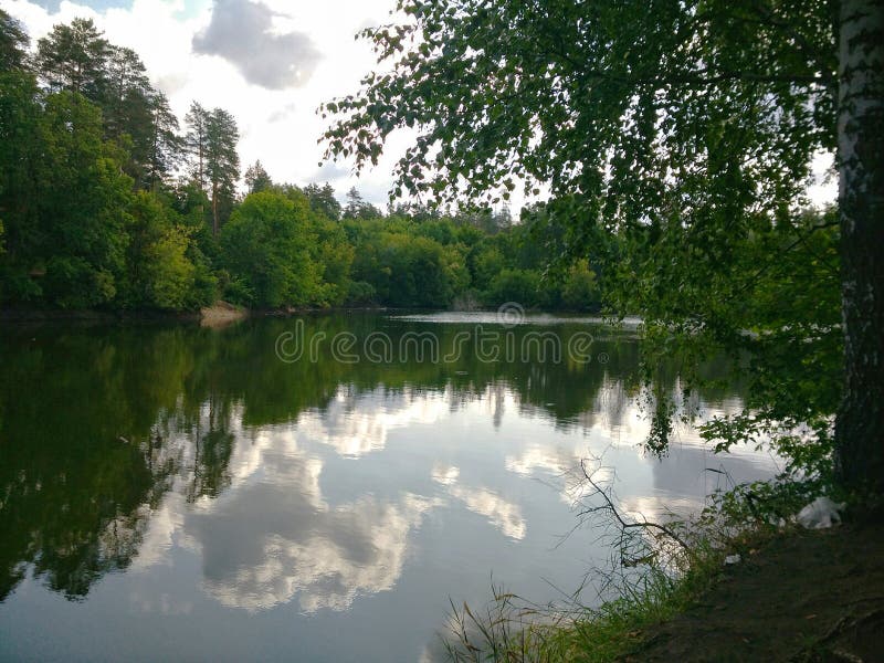 A Beautiful Lake Inside a Green Forest Stock Photo - Image of weathern ...