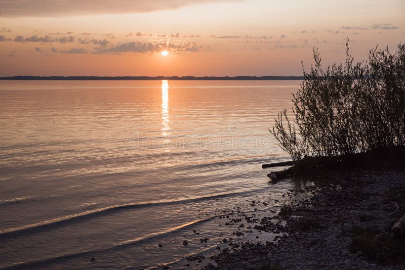 Sunset lake shore stock photo. Image of water, beach - 103157458