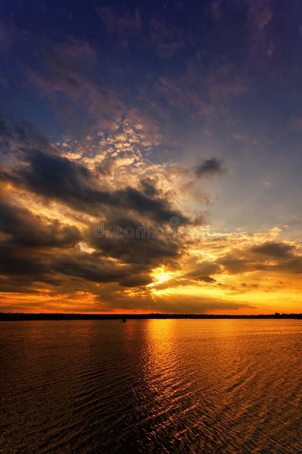 Beautiful Lakeside Sunset with Dramatic Sky and Clouds Stock Image ...