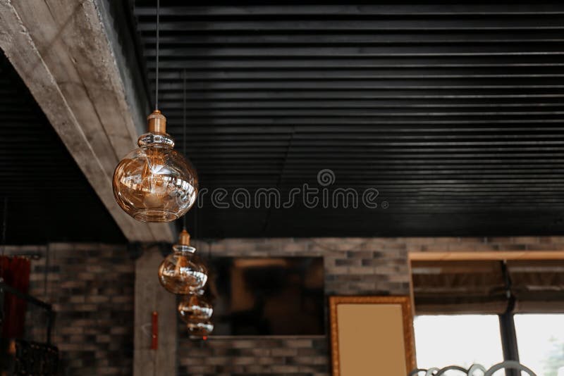 Beautiful Lamps in Cafe Interior Stock Image - Image of lighting ...