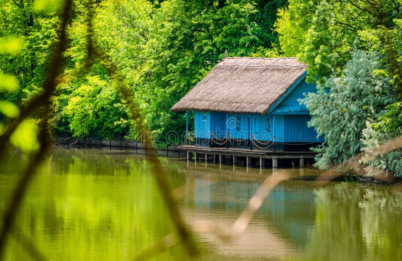 Beautiful Landscape with a Blue House Build on Water Surrounded Stock ...