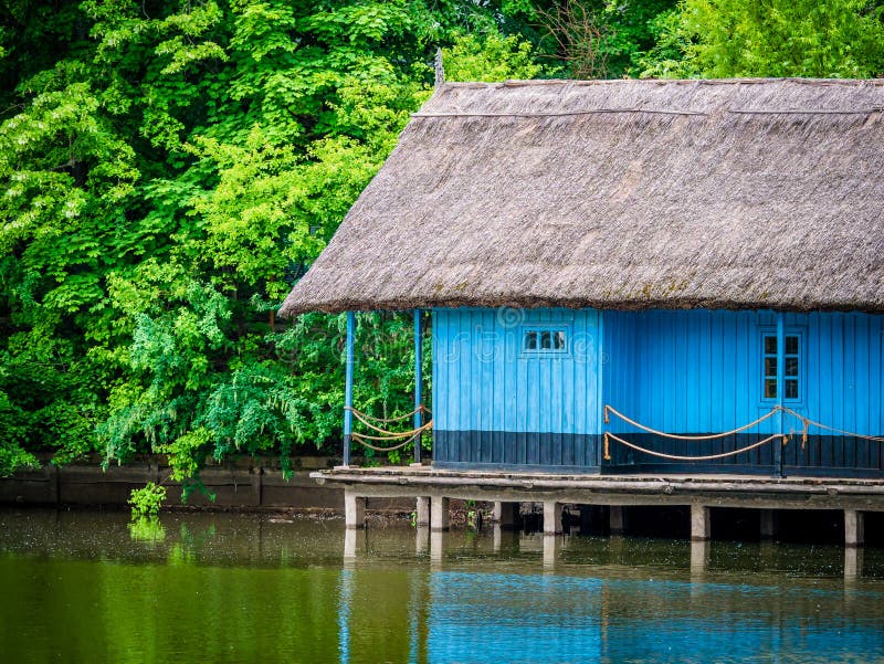 Beautiful Landscape with a Blue House Build on Water Surrounded Stock ...
