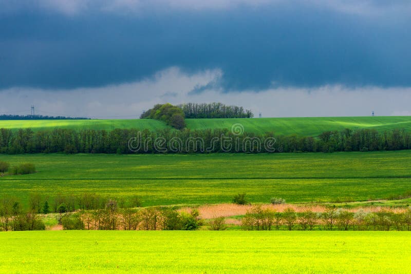 Beautiful Landscape, Green and Yellow Field. Dramatic Sky with Clouds ...