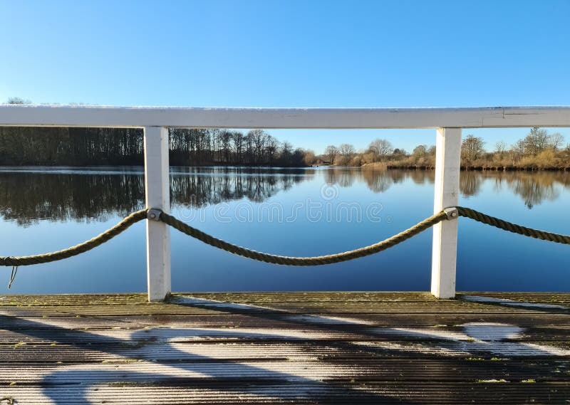 Beautiful Landscape on a Jetty by a Lake with Blue Sky Stock Photo ...