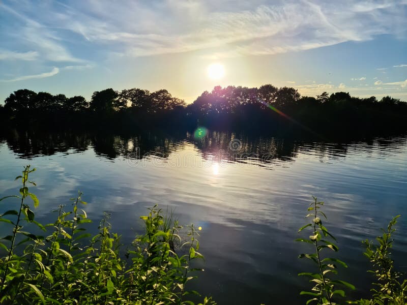 Beautiful Landscape at a Lake with a Reflective Water Surface Stock ...