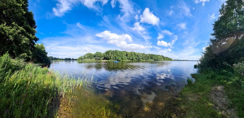 Beautiful Landscape at a Lake with a Reflective Water Surface Stock ...