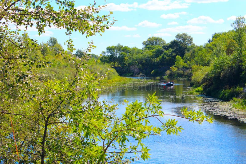 Beautiful Landscape with River and Canoe on it Stock Image - Image of ...