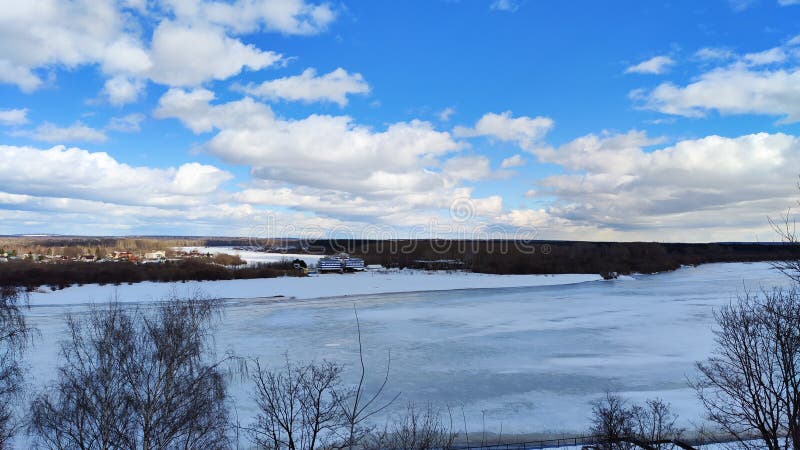 Beautiful Landscape with Sky, Clouds and a River with Ice on a Sunny ...