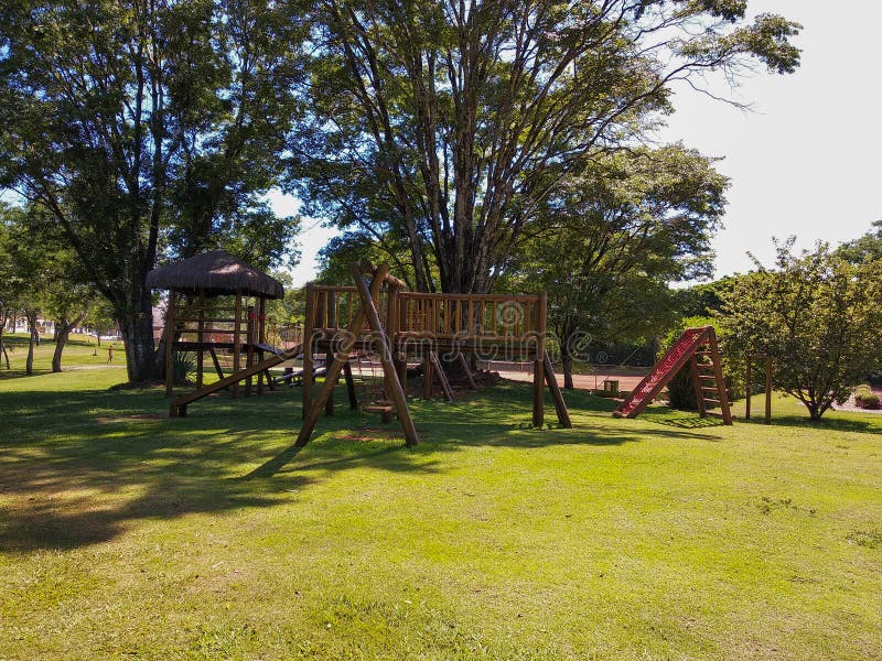 A Beautiful Landscape with a Stable, Shrub and Lawn Stock Photo - Image ...