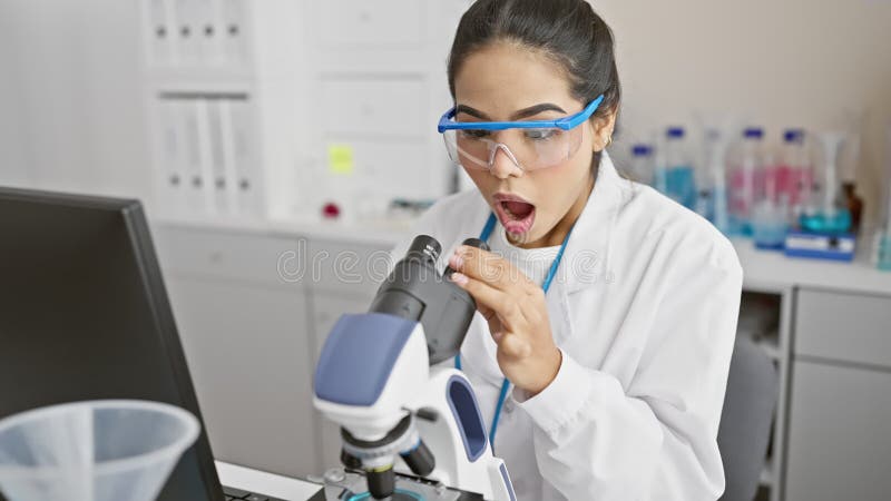 Beautiful Latin Scientist in Shock and Awe Expression at Lab, Fear and ...