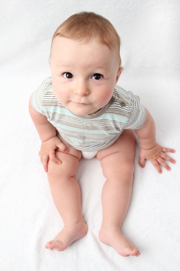 Beautiful Laughing Baby Sitting on Bed Stock Image - Image of baby ...