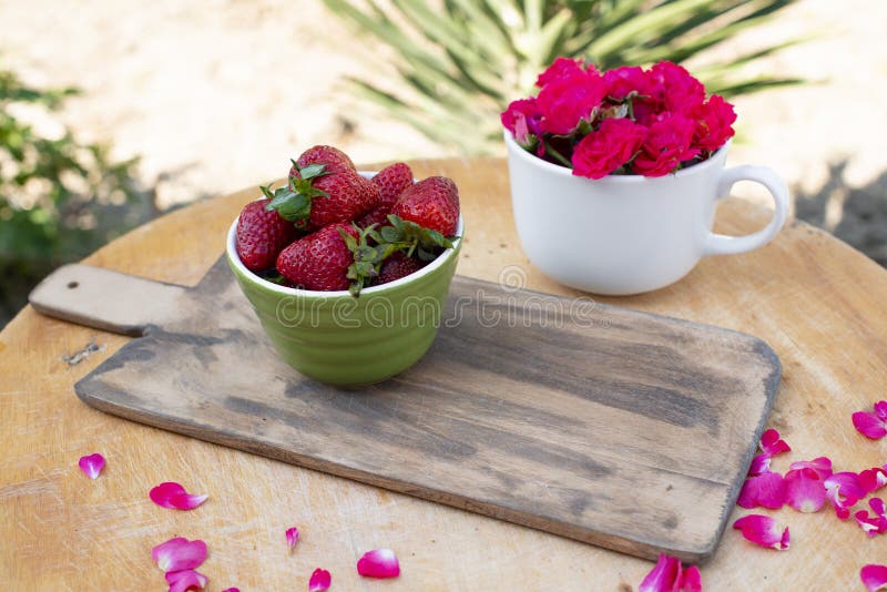 Beautiful Layout with Board with Bowl with Strawberries Lying on Table ...
