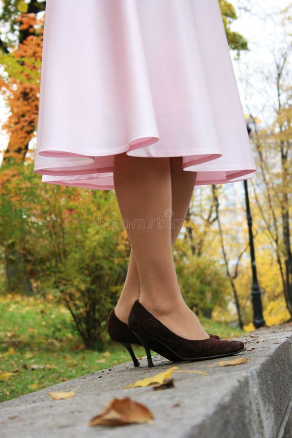 Beautiful Legs in a Pink Skirt Stock Photo - Image of beautiful, heel ...