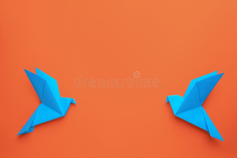Beautiful Light Blue Origami Birds on Orange Background, Flat Lay ...