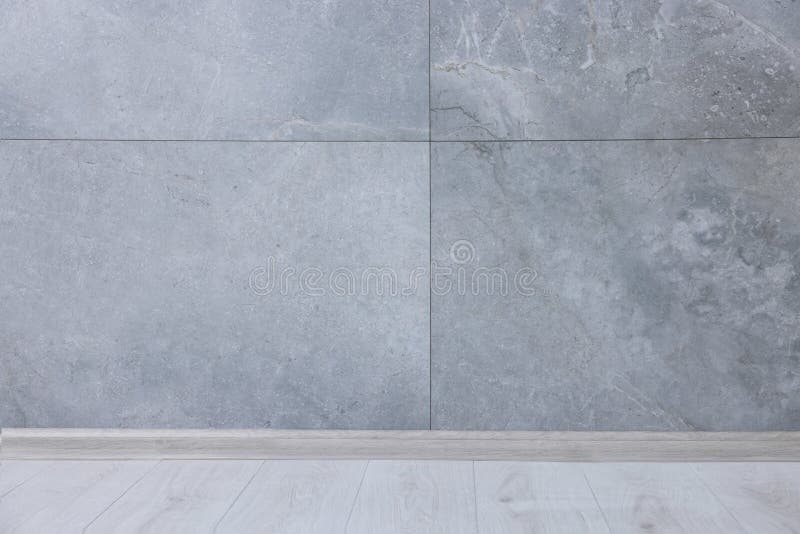 Beautiful Light Grey Tiled Wall and Wooden Floor in Clean Empty Room ...