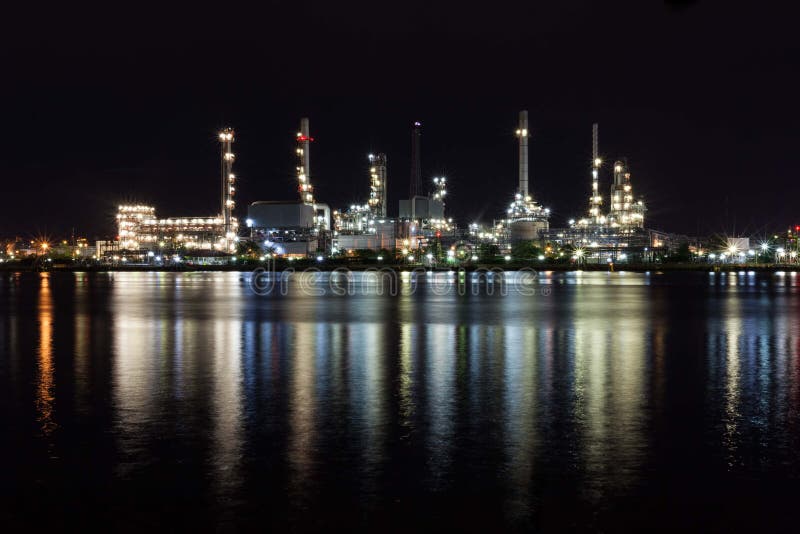 Light Oil Refinery at Twilight with Physical System Icons Diagram on ...