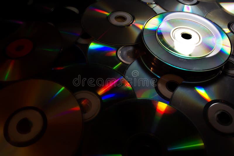 Beautiful Light To Old DVD Discs Stock Photo - Image of blank, storage ...
