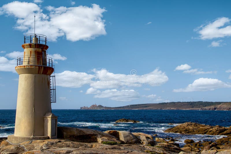 Beautiful Lighthouse by the Coast Stock Photo - Image of cloud, journey ...