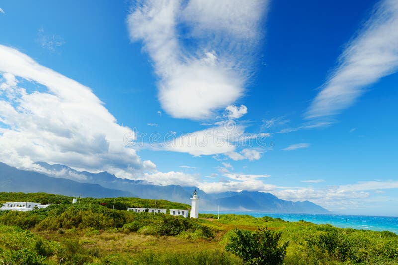 The Beautiful Lighthouse Stand in the Middle of Skyline Stock Photo ...