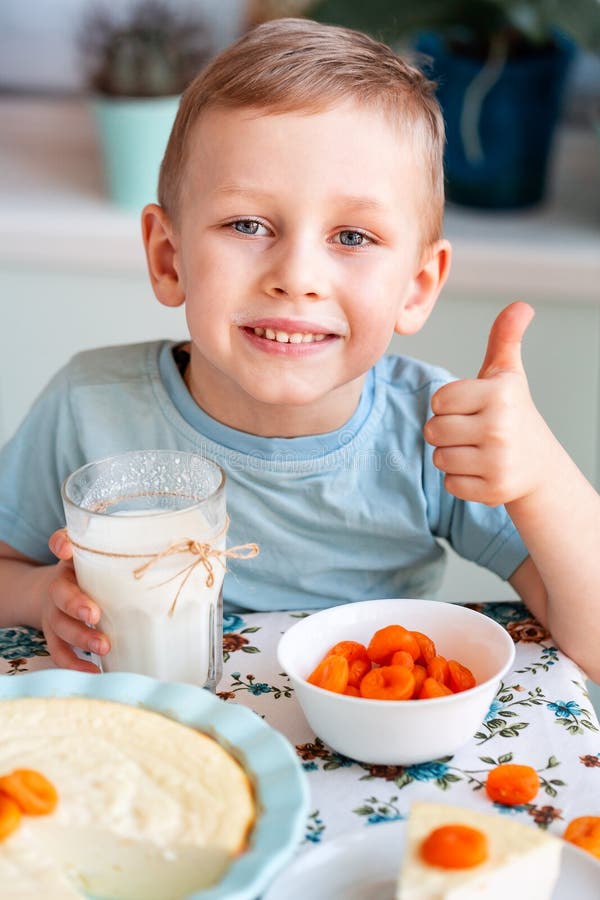 Beautiful Little Boy Eating Breakfast in Kitchen at Home Stock Image ...