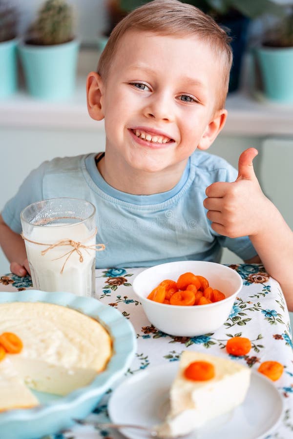 Beautiful Little Boy Eating Breakfast in Kitchen at Home Stock Image ...