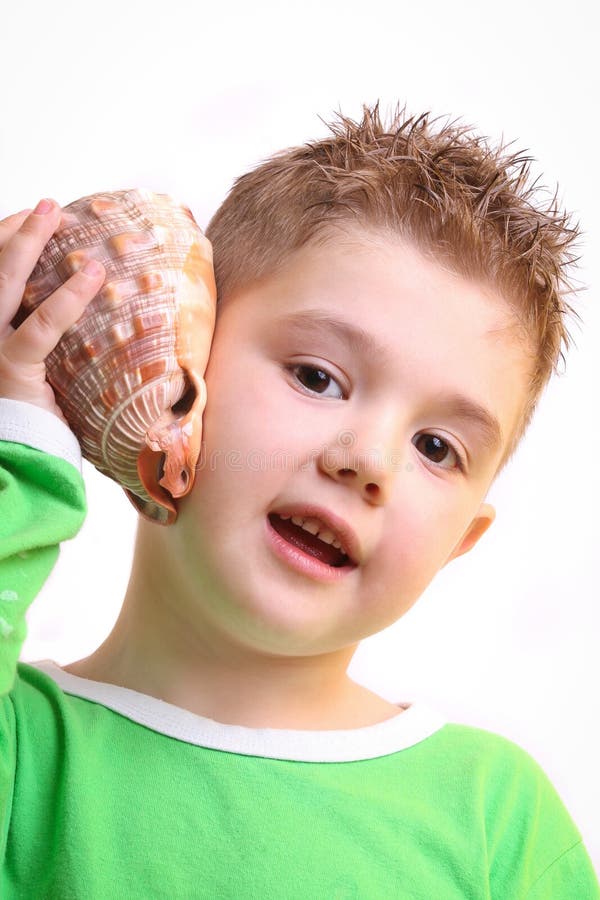 Beautiful Little Boy with a Shell from the Sea Stock Image - Image of ...