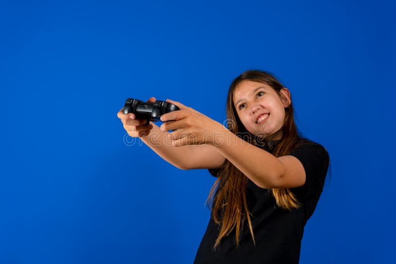 Beautiful Little Girl Playing with a Game Console Controller Isolated ...