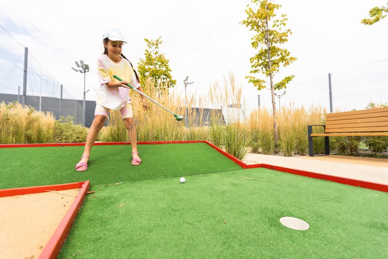 Beautiful Little Girl Playing Mini Golf Stock Photo - Image of little ...
