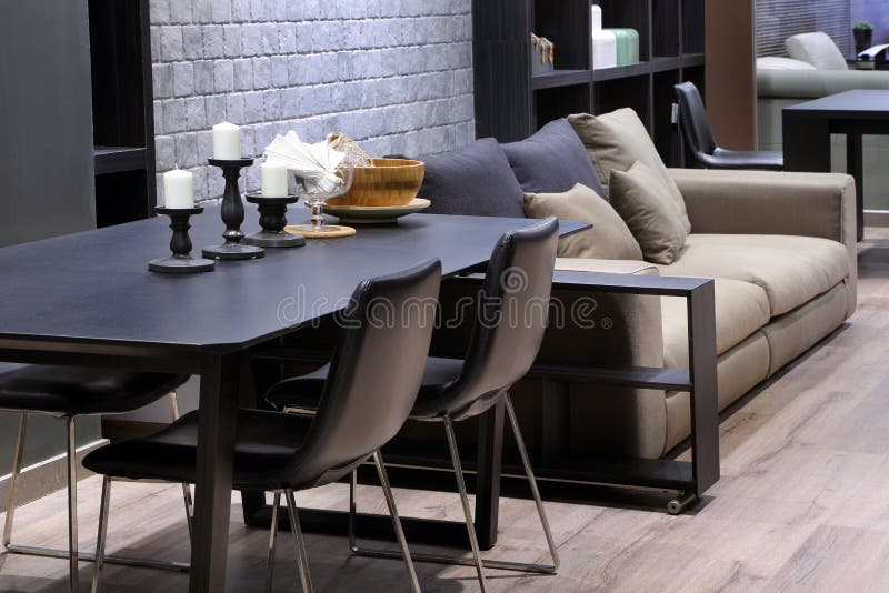 Beautiful Living Room with Sofa and Table on Wooden Floor Stock Photo ...