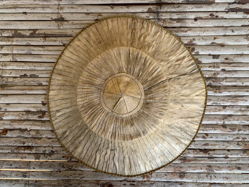 Bamboo hat with bamboo mat stock image. Image of local - 140338535