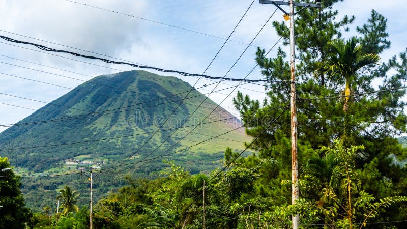 The Beautiful Lokon Mountain in Tomohon City Stock Image - Image of ...