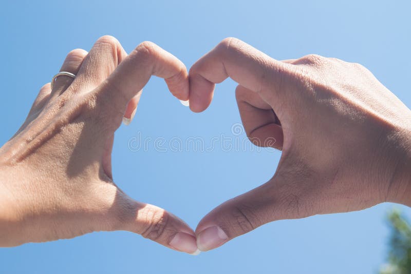 Beautiful Love Shape Hands - Heart on Blue Sky Stock Photo - Image of ...