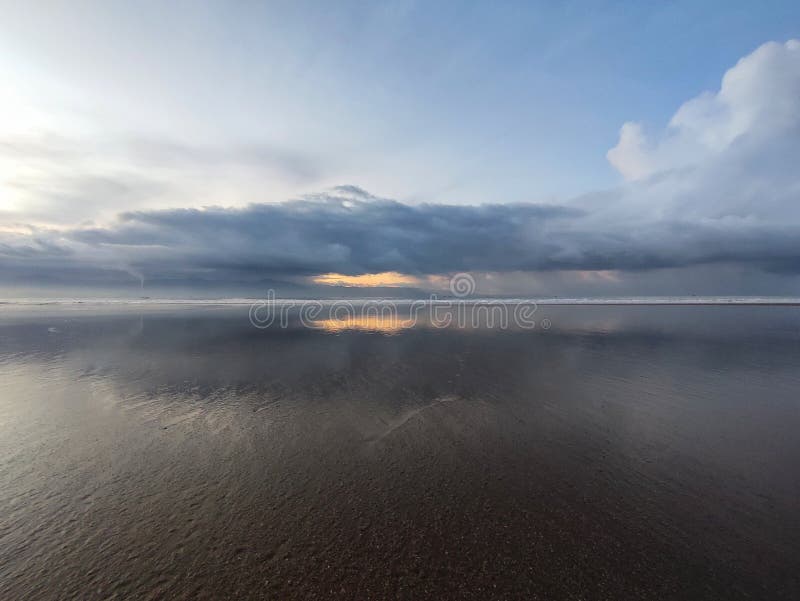 Beautiful and Lovely Sunrise Cloud Reflection View at the Beach Stock ...