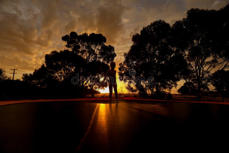 Beautiful Low Angle Shot of a Boy S Silhouette at Sunrise Stock Photo ...