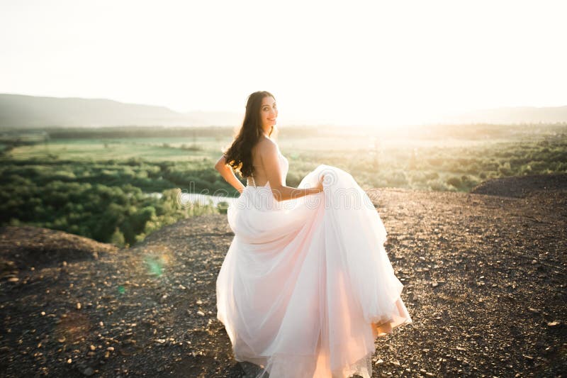 Beauty Portrait of Bride Wearing Fashion Wedding Dress with Feathers ...