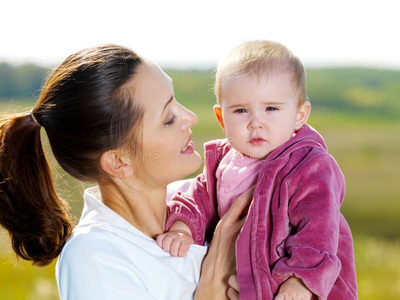 Beautiful Mather with Smiling Beby on Nature Stock Image - Image of ...