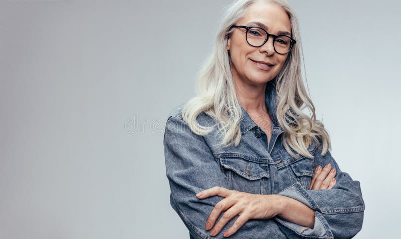 Beautiful Senior Woman Shirtless Against Grey Background Stock Image