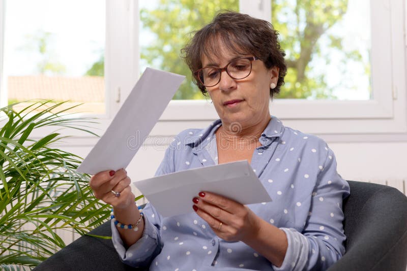 Beautiful Mature Woman Opens the Mail Stock Photo - Image of read ...