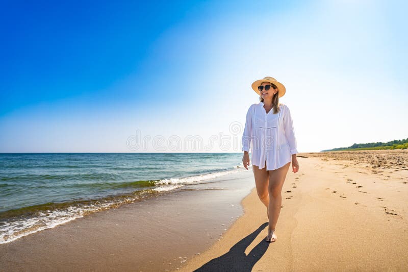 Beautiful Mature Woman Walking on Sandy Beach. Front View Stock Image ...