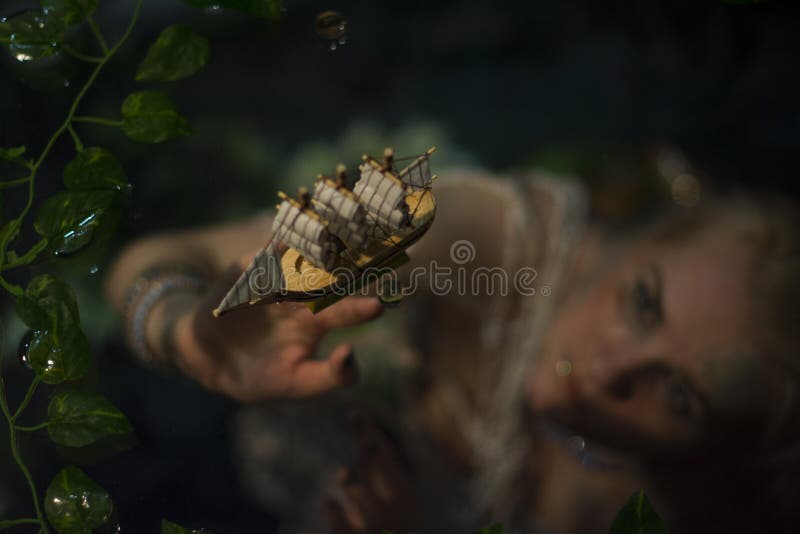 The Beautiful Mermaid Hit the Net Underwater Stock Photo - Image of ...
