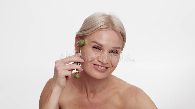 Skincare Concept Portrait Beautiful Mature Woman Applying Serum On Her