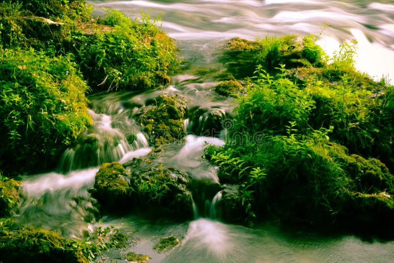 Mini Waterfall stock image. Image of mini, ducks, nfriendship - 102210735