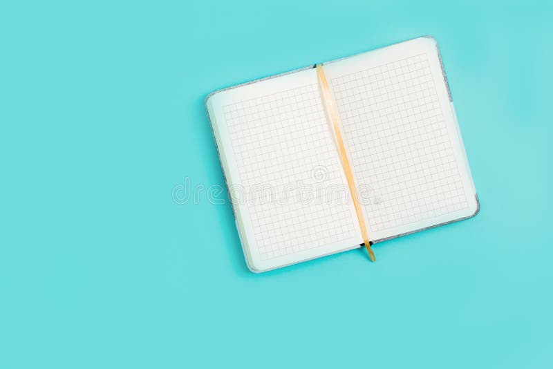 Beautiful Miniature Open Notepad on Blue Paper Background. Office, Work ...