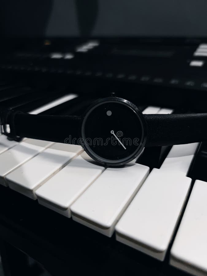 Beautiful Minimalist Watch on Top of Piano Stock Photo - Image of watch ...
