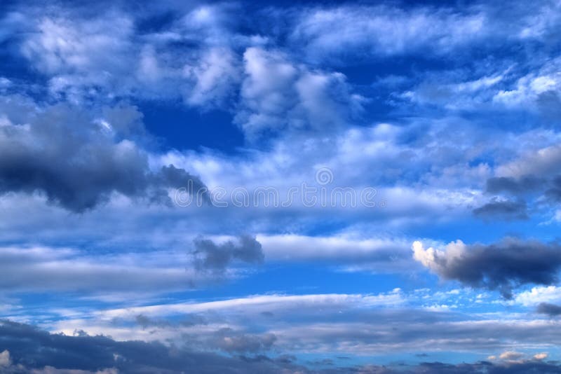 Beautiful Mixed Cloud Formations with White and Grey Cumulus Clouds in ...